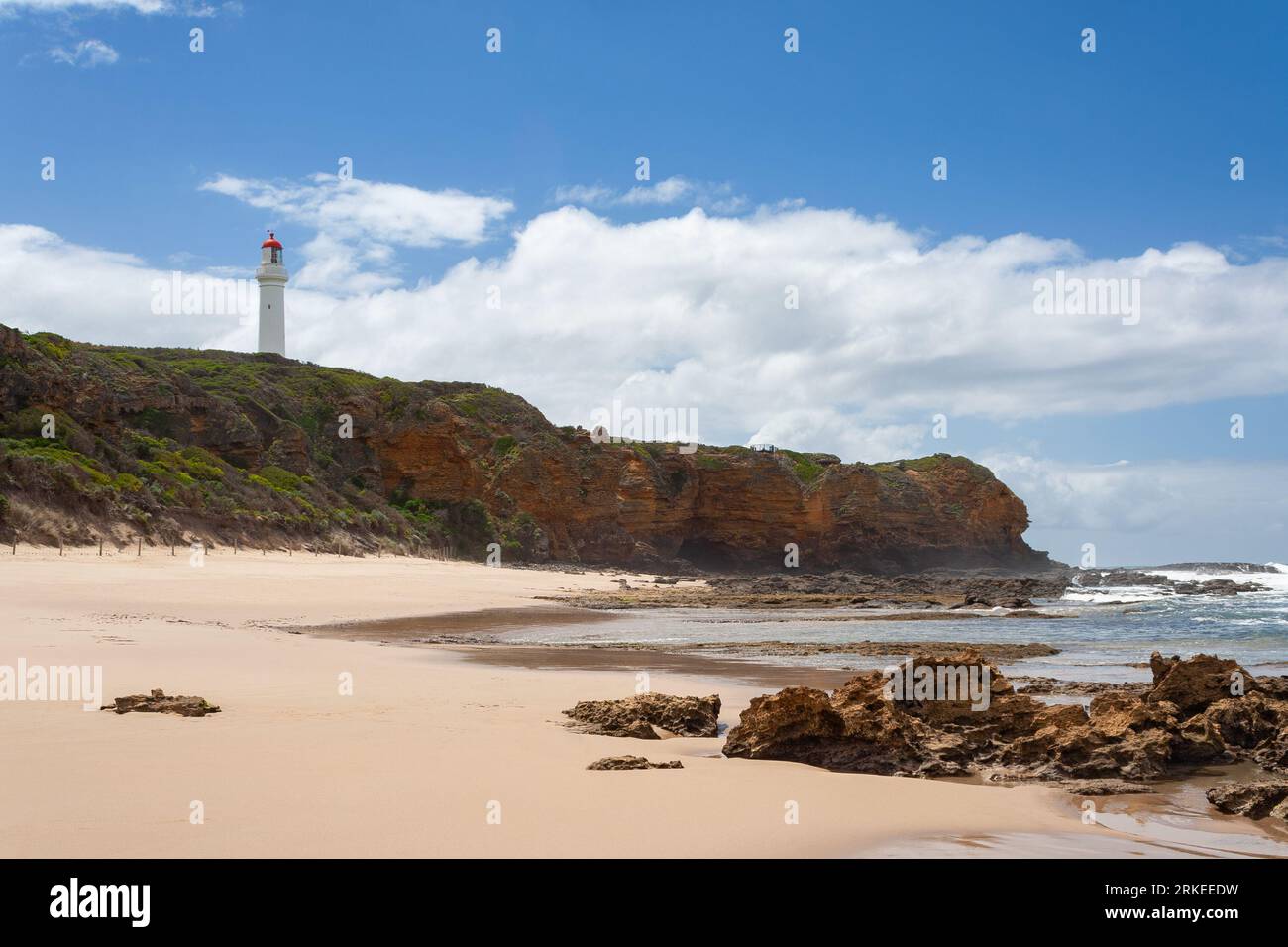 Coastal Split Point lighthouse located on limestone cliffs near ...