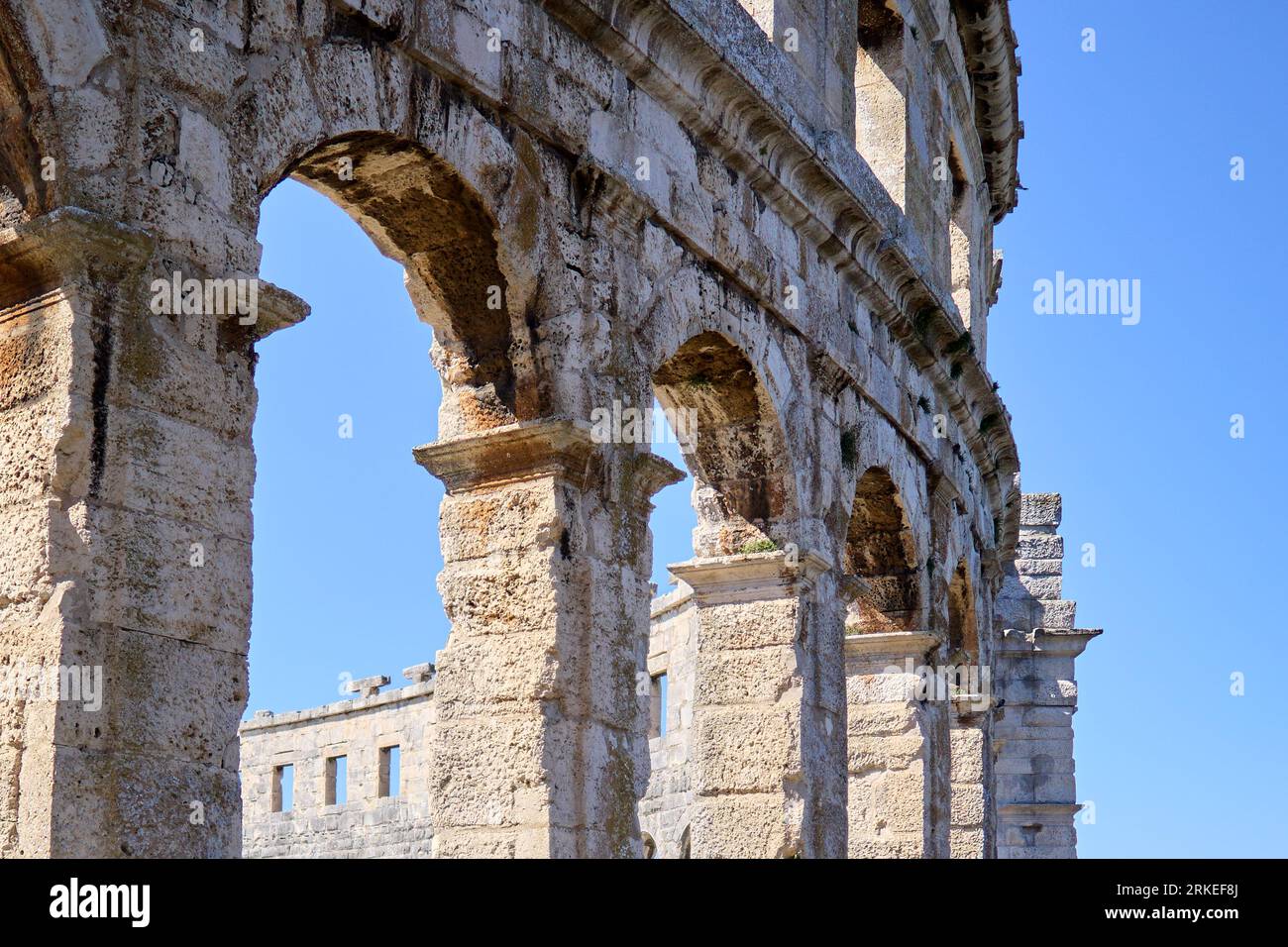 The roman amphitheatre Pula Arena located in Pula, Croatia Stock Photo ...