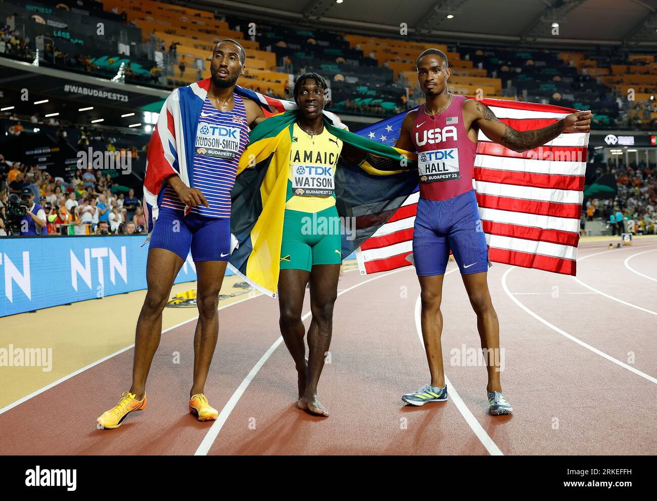 Budapest, Hungary. 24th Aug, 2023. Gold medalist Antonio Watson (C) of Jamaica, silver medalist ...