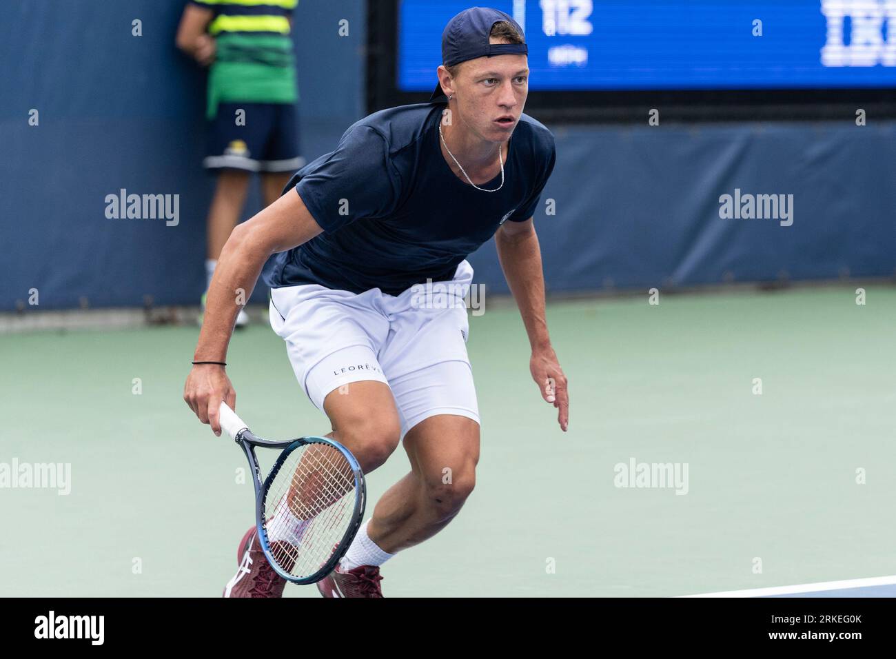 New York, New York, USA. 24th Aug, 2023. Aidan Mayo of USA returns ball during 2nd round match ...