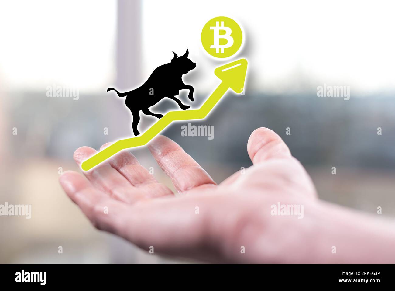 Bitcoin bullish trend concept above a hand of a man Stock Photo - Alamy