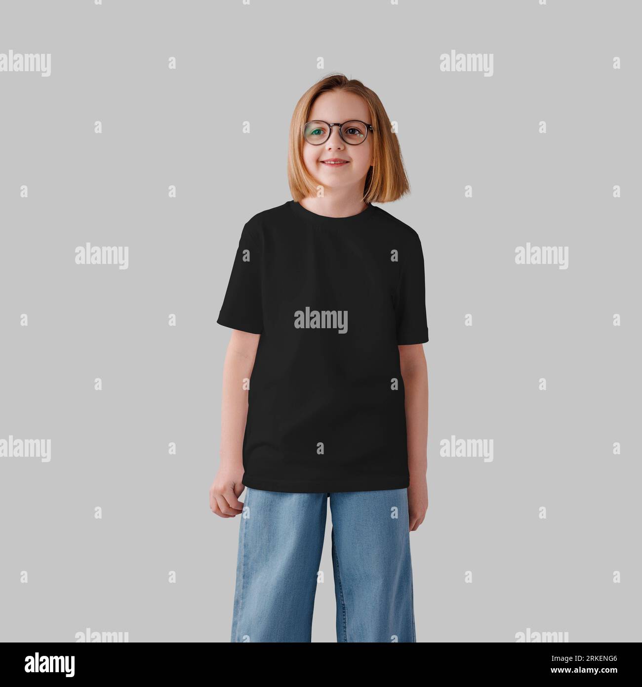 Black t-shirt mockup on a smiling girl, closeup, front view. Texture ...