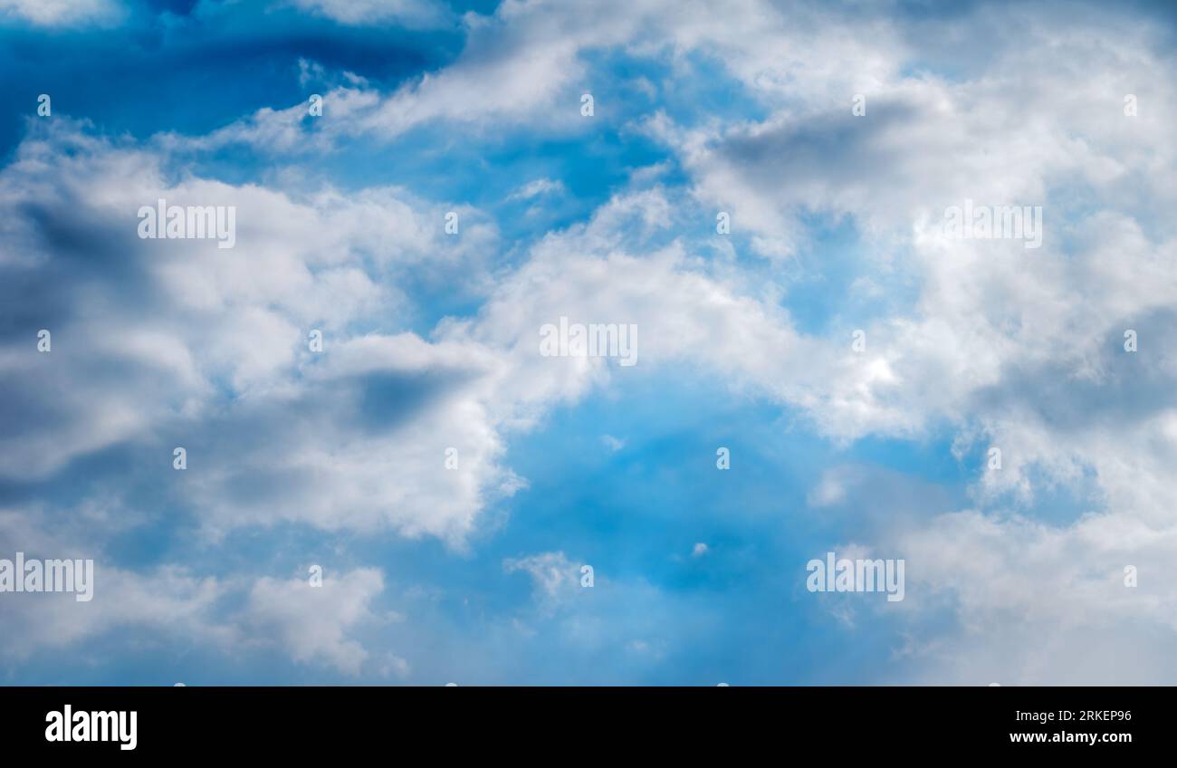 Thundercloud and smaller surrounding clouds. Cloudscape Stock Photo - Alamy