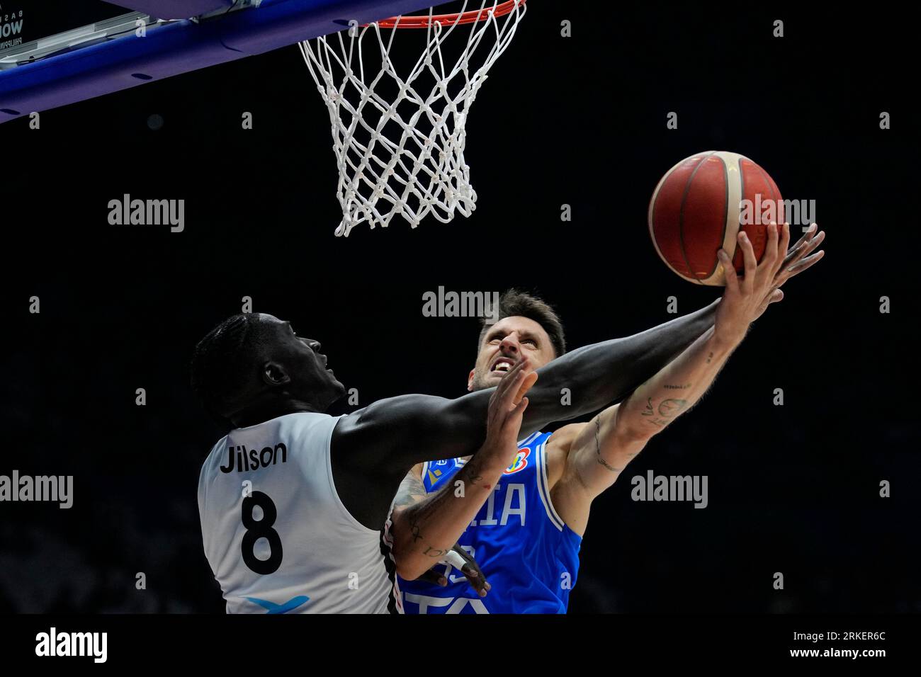 Italy forward Achille Polonara (33) shoots against Angola center Jilson ...