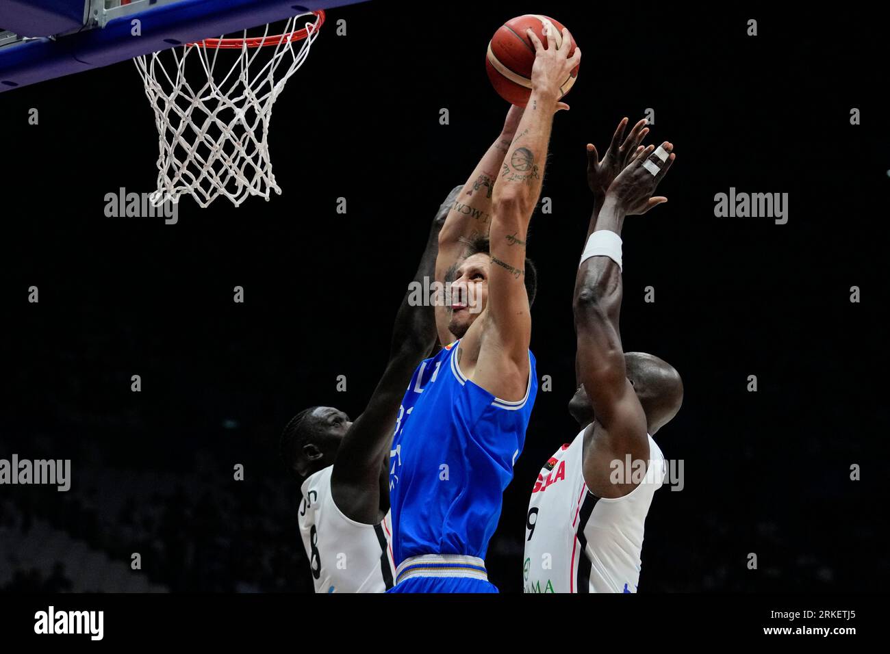 Italy forward Achille Polonara (33) shoots against Angola center Jilson ...