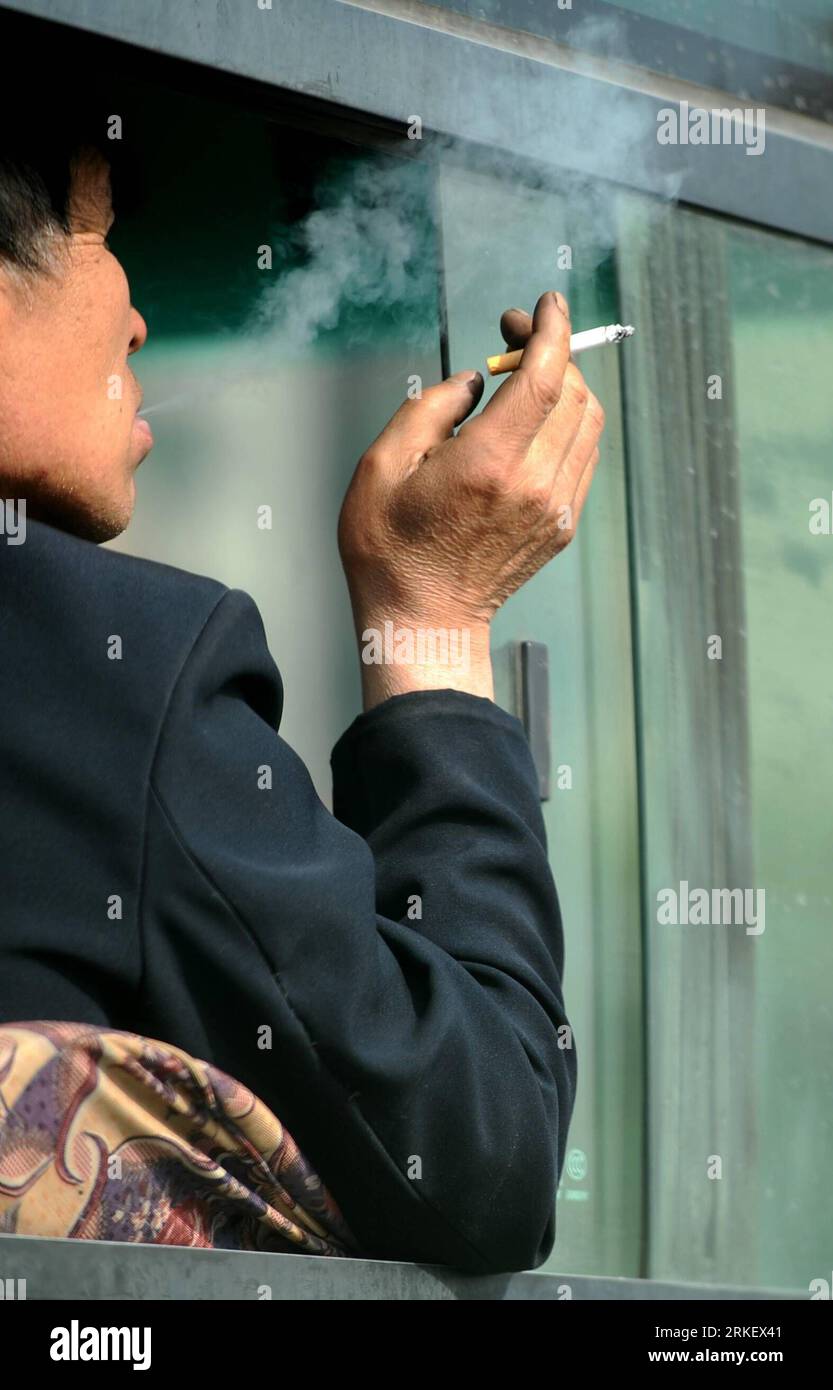 Smoking on the bus hi-res stock photography and images - Alamy