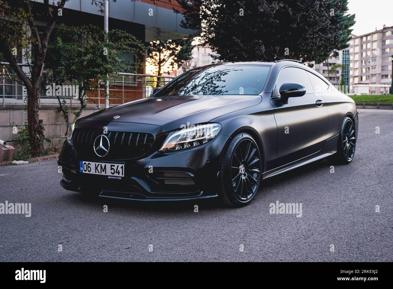 Black Mercedes Benz C63s AMG at city sunset Stock Photo - Alamy