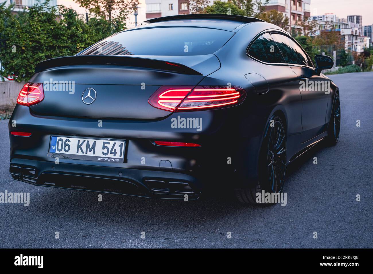 Black Mercedes Benz C63s AMG at city sunset Stock Photo - Alamy