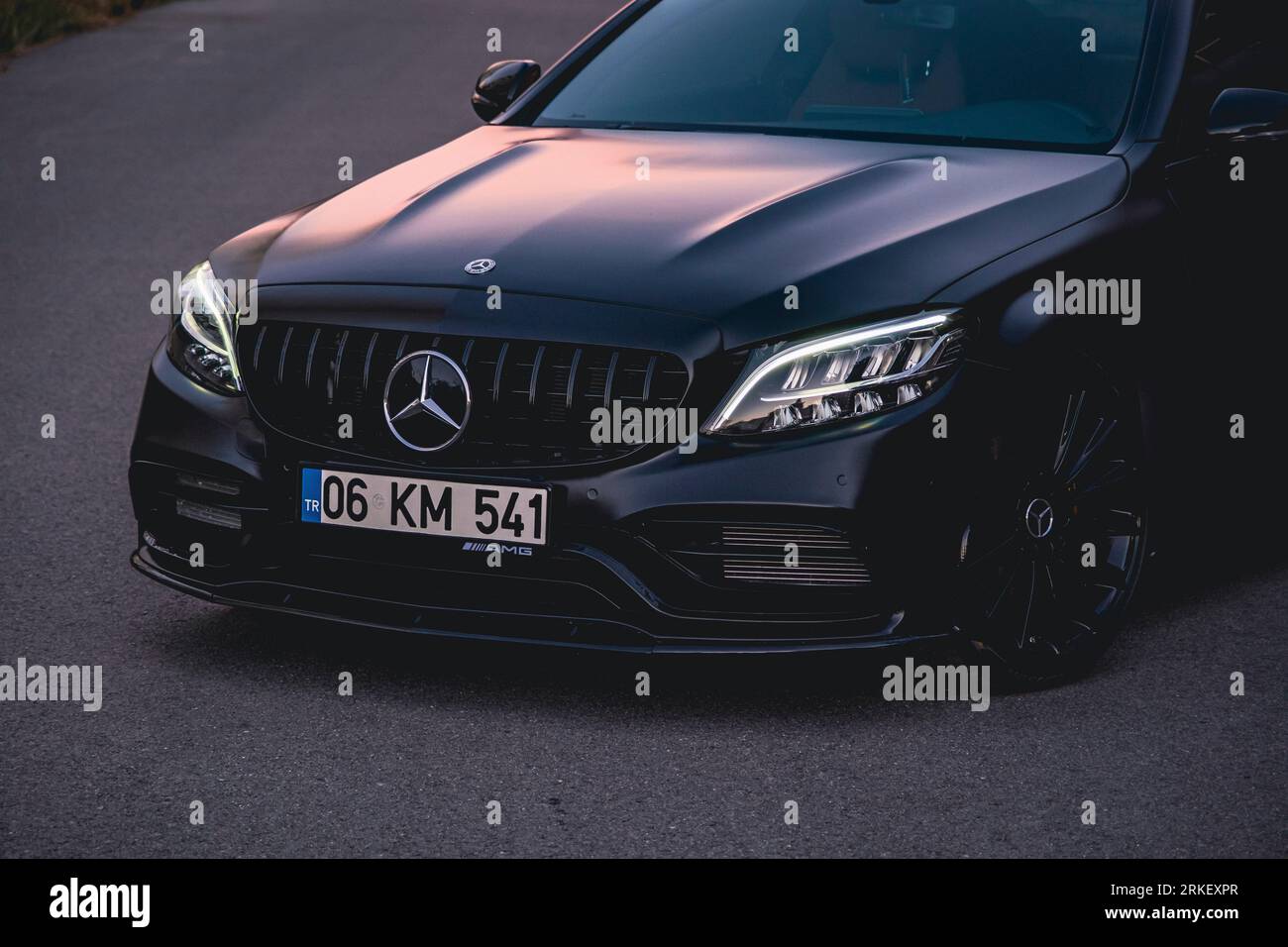 Black Mercedes Benz C63s AMG at city sunset Stock Photo - Alamy