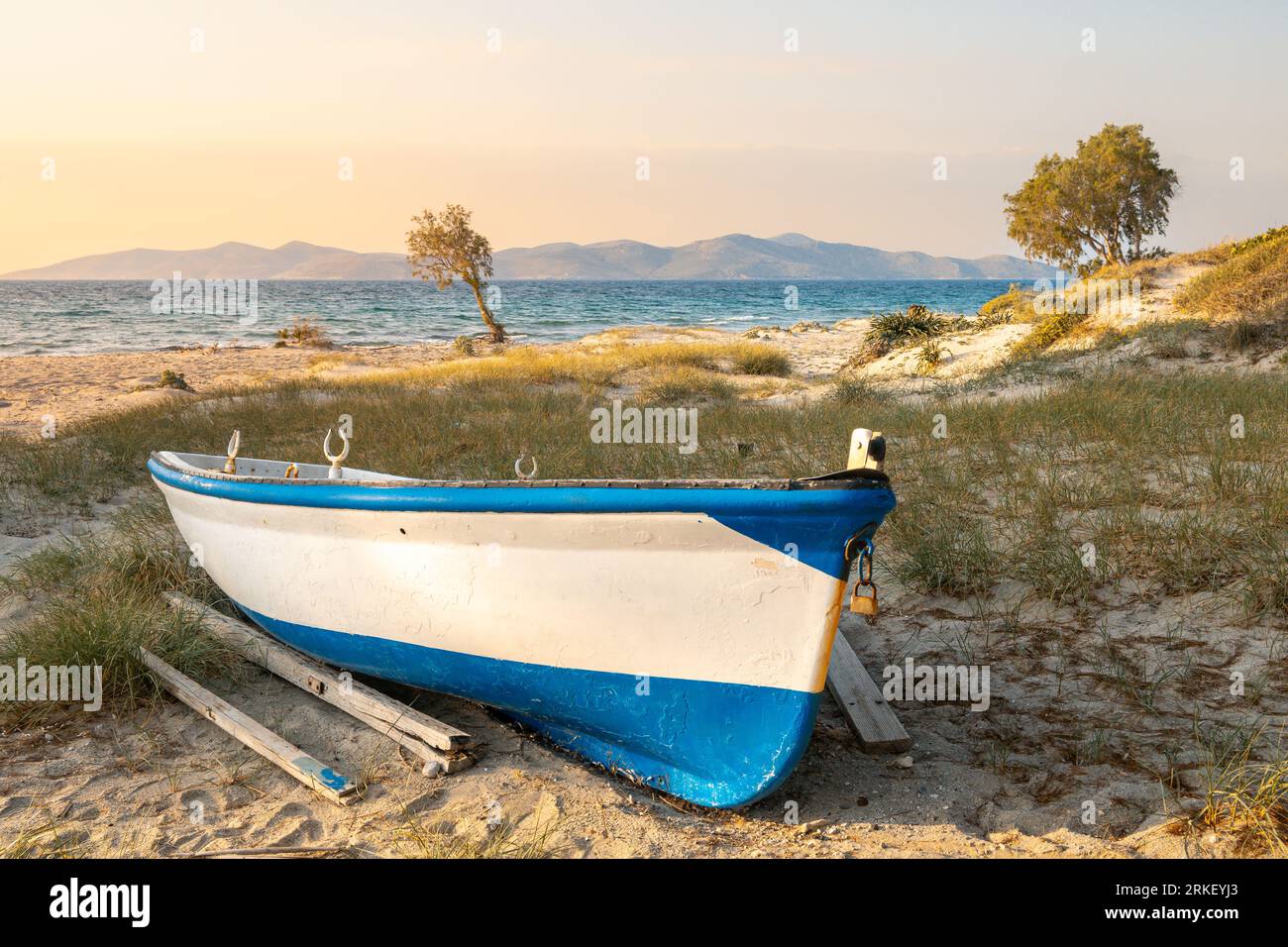 Boat on sandy beach of Marmari. The Greek island of Kos Stock Photo - Alamy