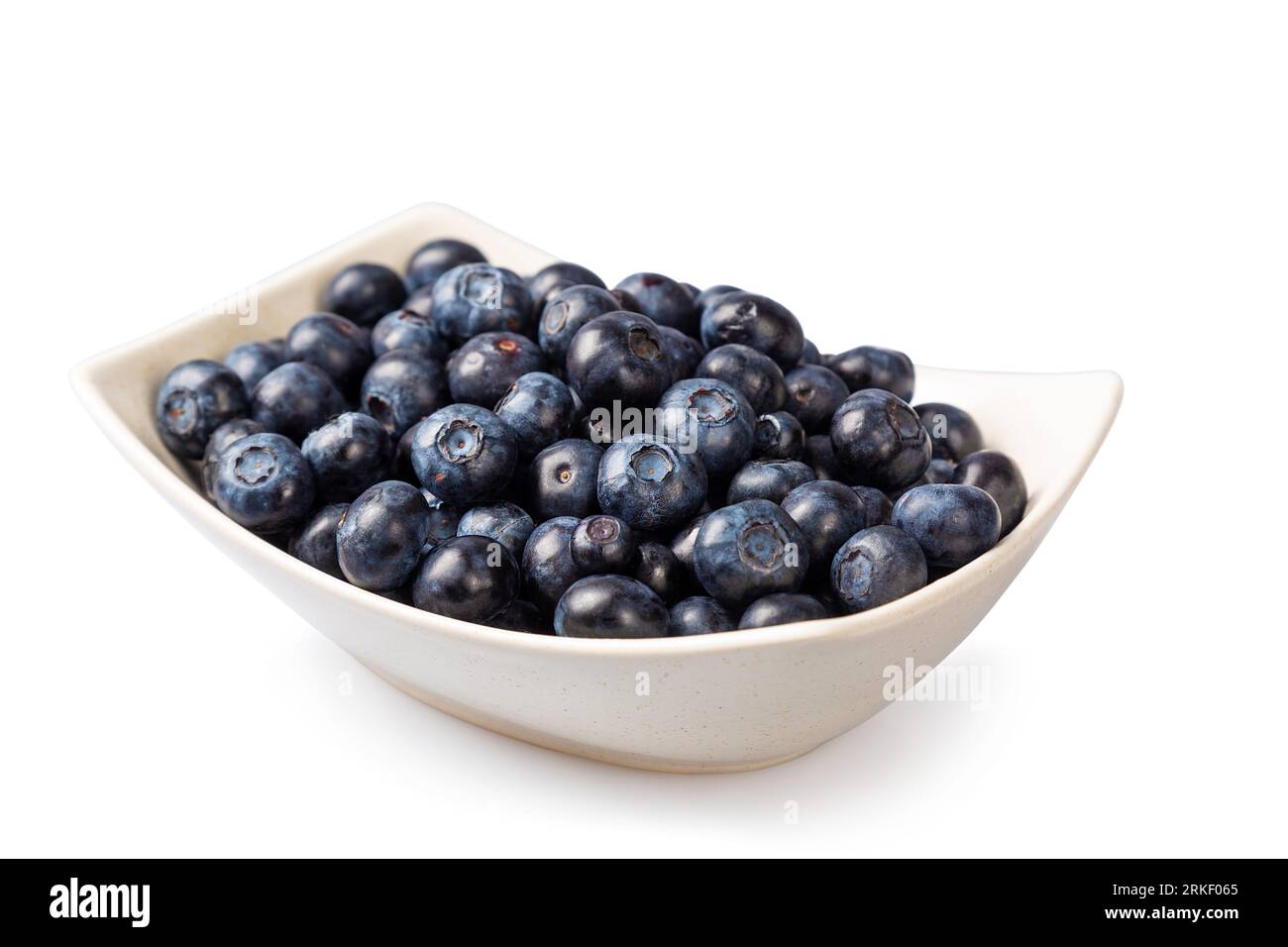 Blueberries in blue plate hi-res stock photography and images - Alamy