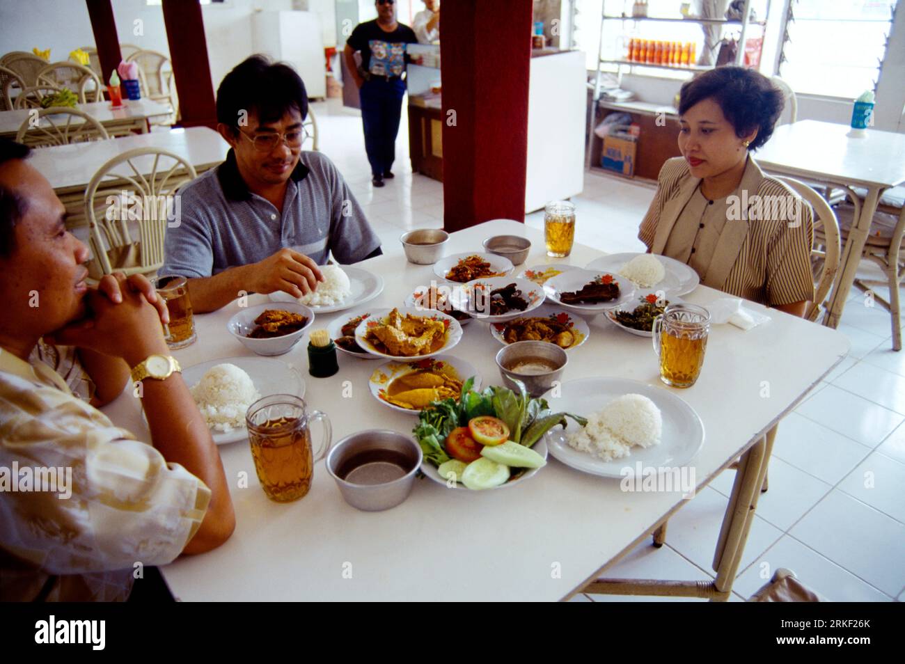 Bogor Indonesia Lunch Of Rice, Chicken Prawns, Pork, Tea & Chili Leaves ...
