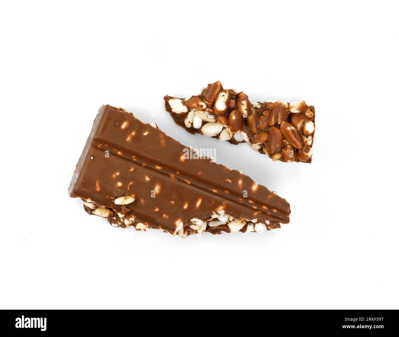 Chunks of milk chocolate with puffed rice isolated on white background ...