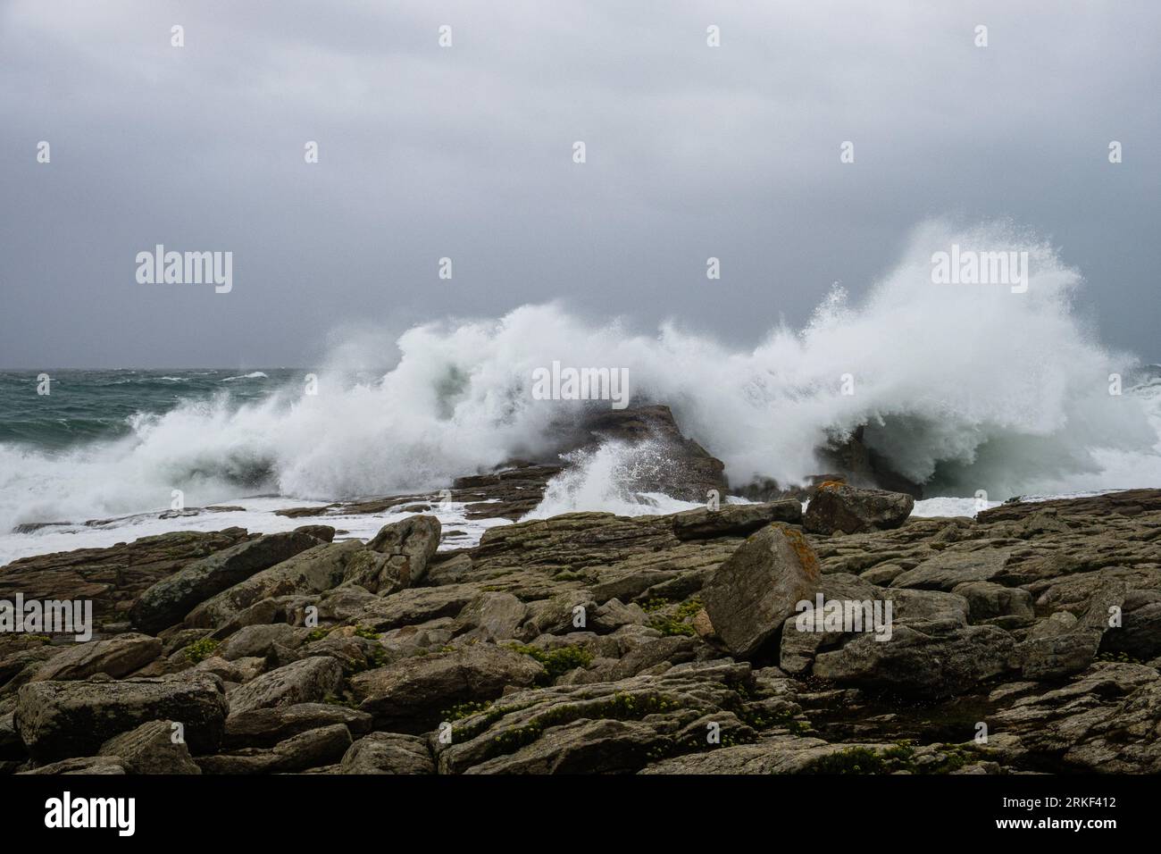 Waves breaking on the rocks on a stormy day on the Brittany coast Stock ...