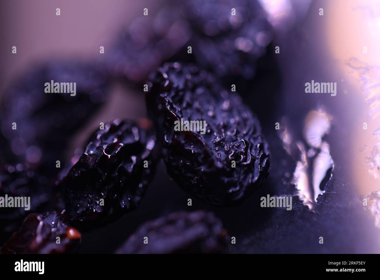 Raisins black texture hi-res stock photography and images - Alamy