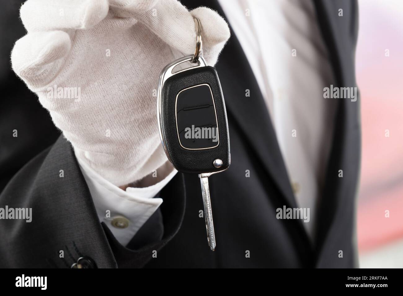 Close-up Of A Valet Boy Holding A Car Key Outside The Car Stock Photo ...