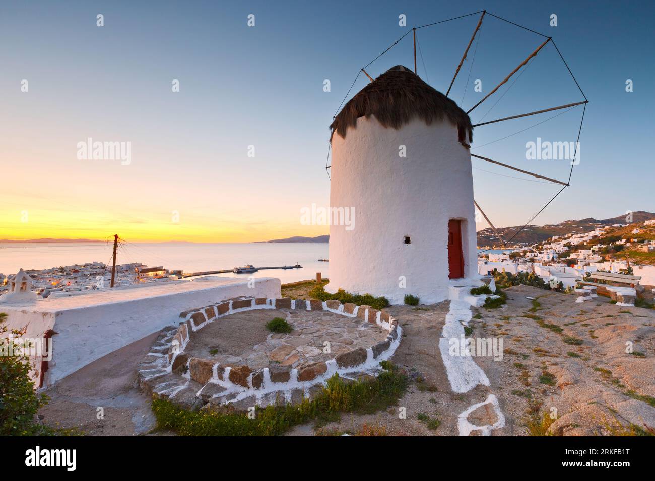 Traditional windmill over the town of Mykonos, Greece Stock Photo - Alamy