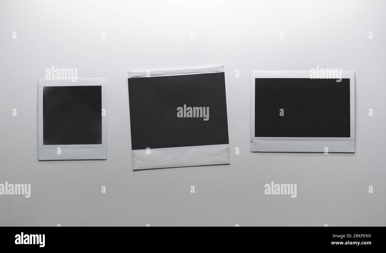 Set of photo frames. Vintage empty photos frame on white wall. Images ...