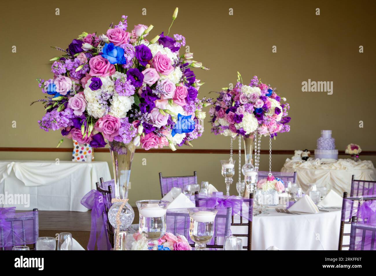Tables with centerpieces for a reception Stock Photo - Alamy