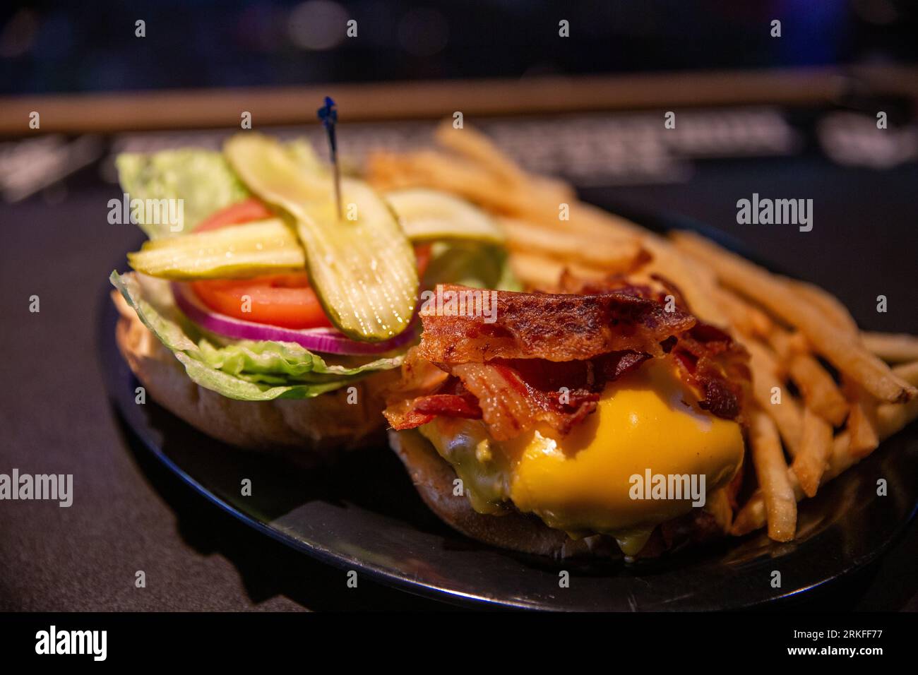 Crispy bacon cheese burger and fries Stock Photo - Alamy