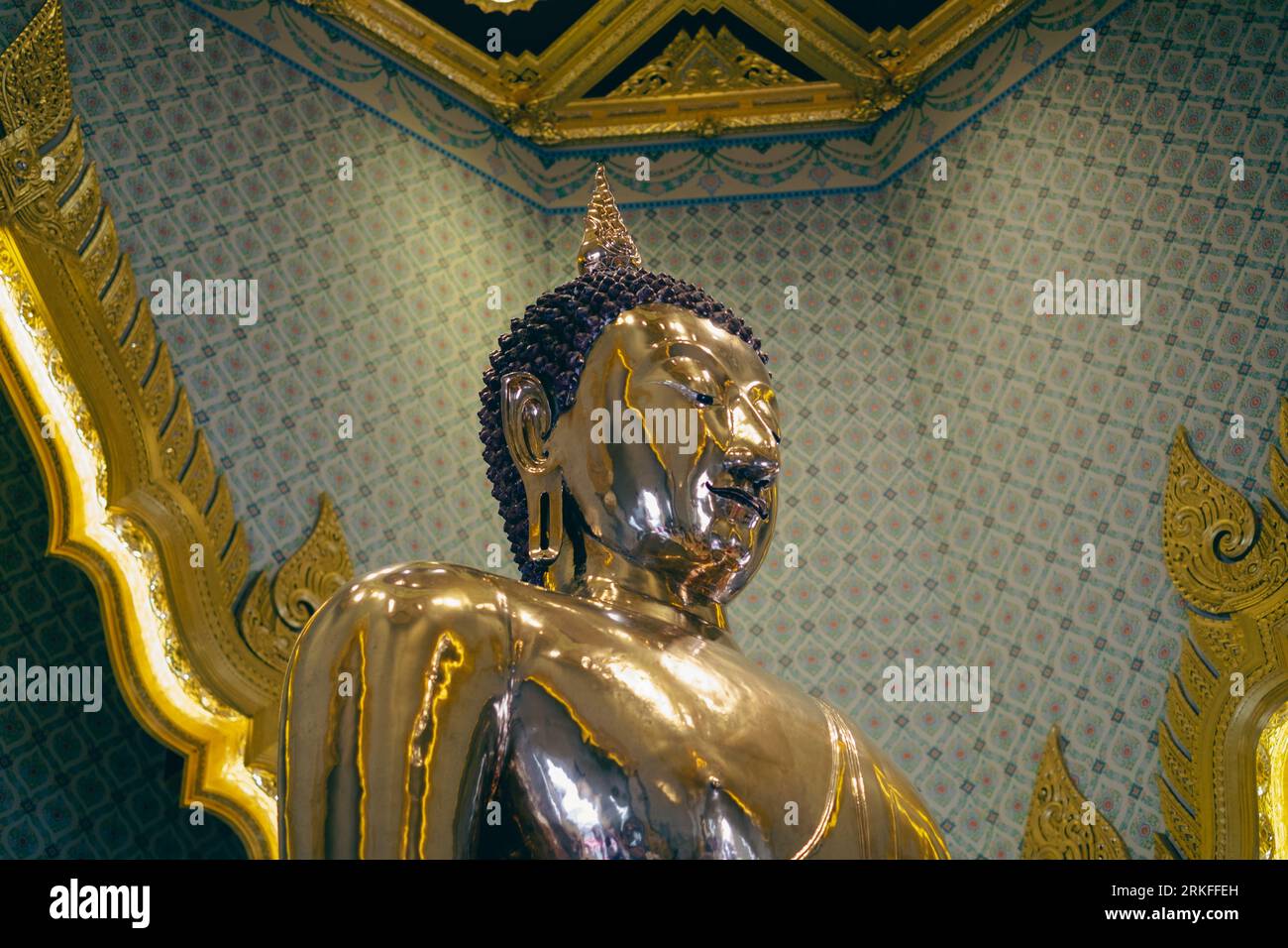 Gold Buddha statue inside a temple Stock Photo - Alamy