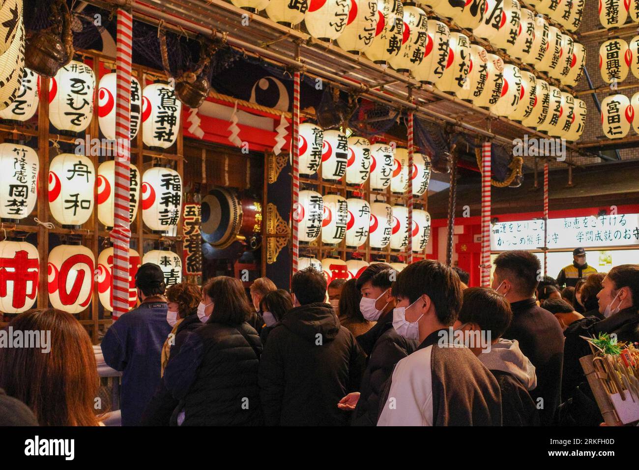 A crowd at Toro no Ichi Festival in Asakusa, Tokyo, Japan at night ...