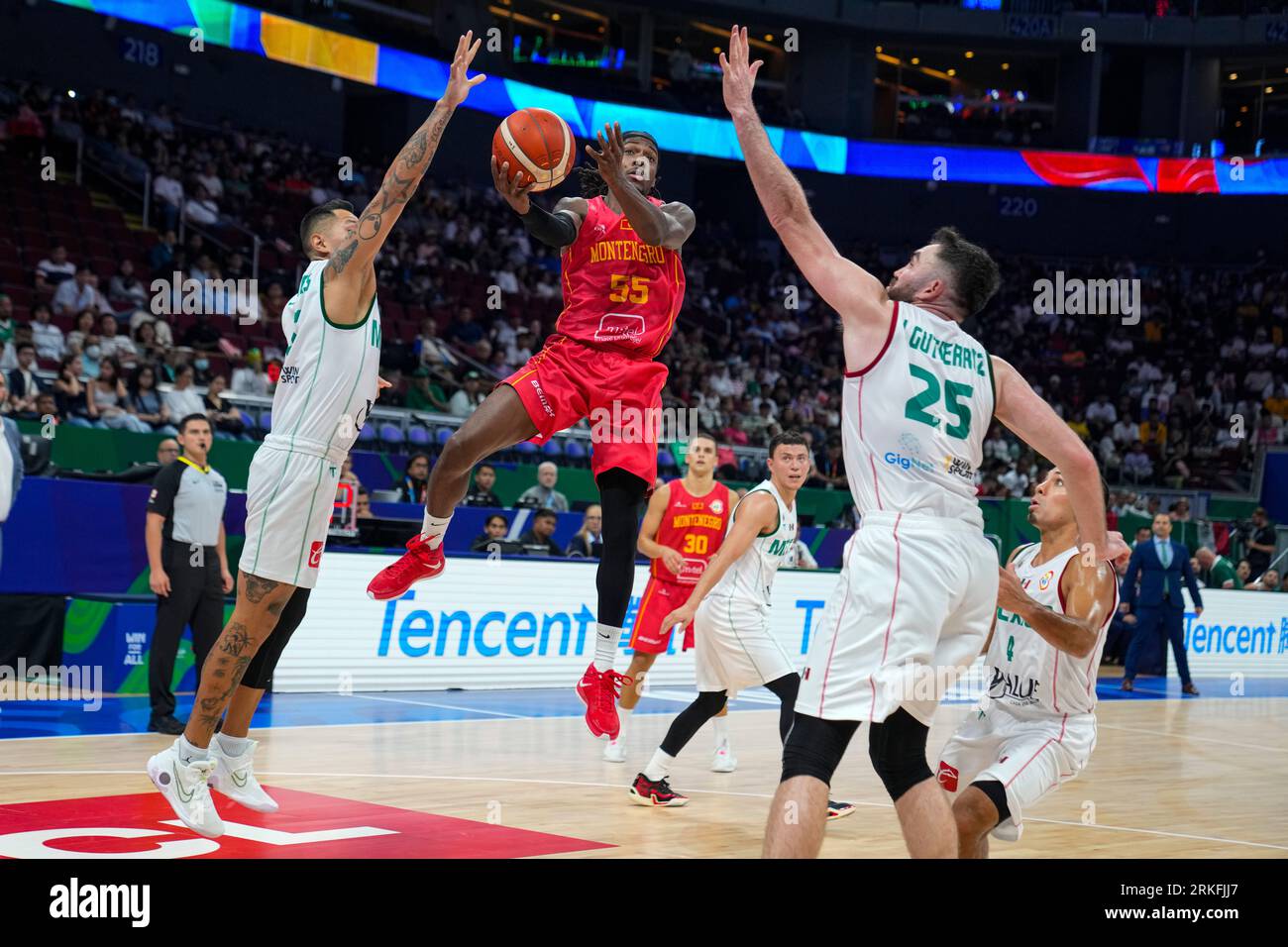 Montenegro guard Kendrick Perry (55) shoots between Mexico forward ...