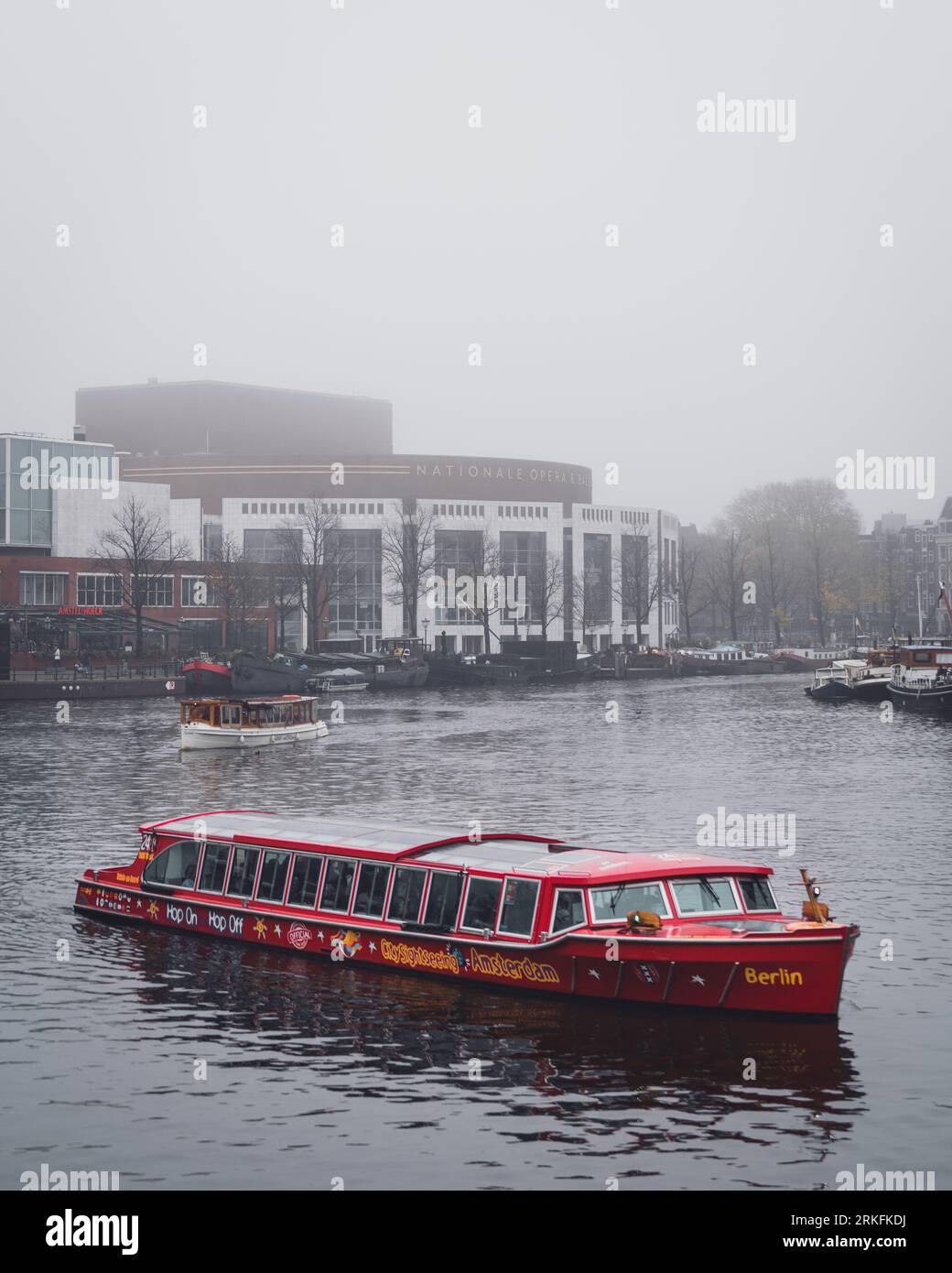 Amsterdam, Netherlands - November 27 2022: A river cruise sails down ...