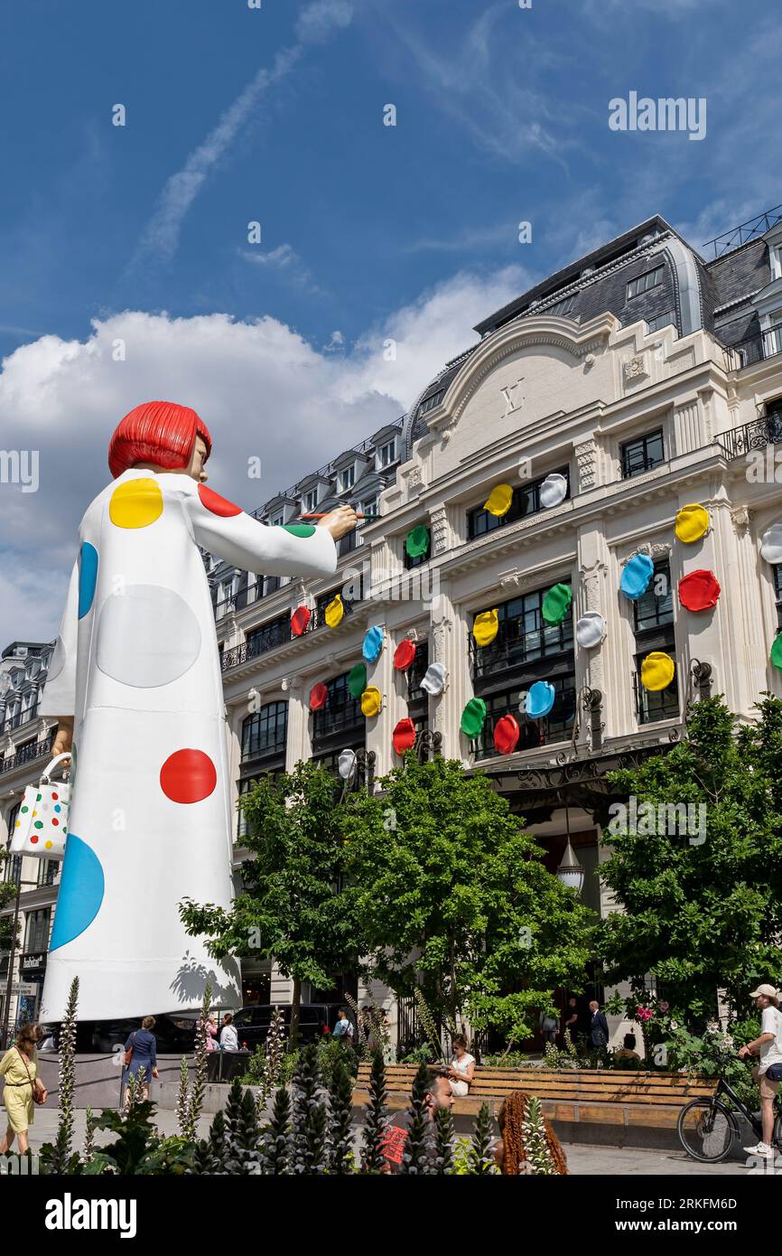 Luxury shopping. Huge sculpture in the likeness of Japanese artist ...