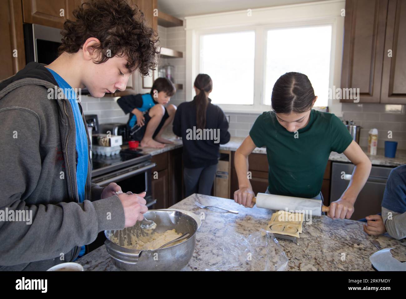 Children cooking food together as family Stock Photo - Alamy