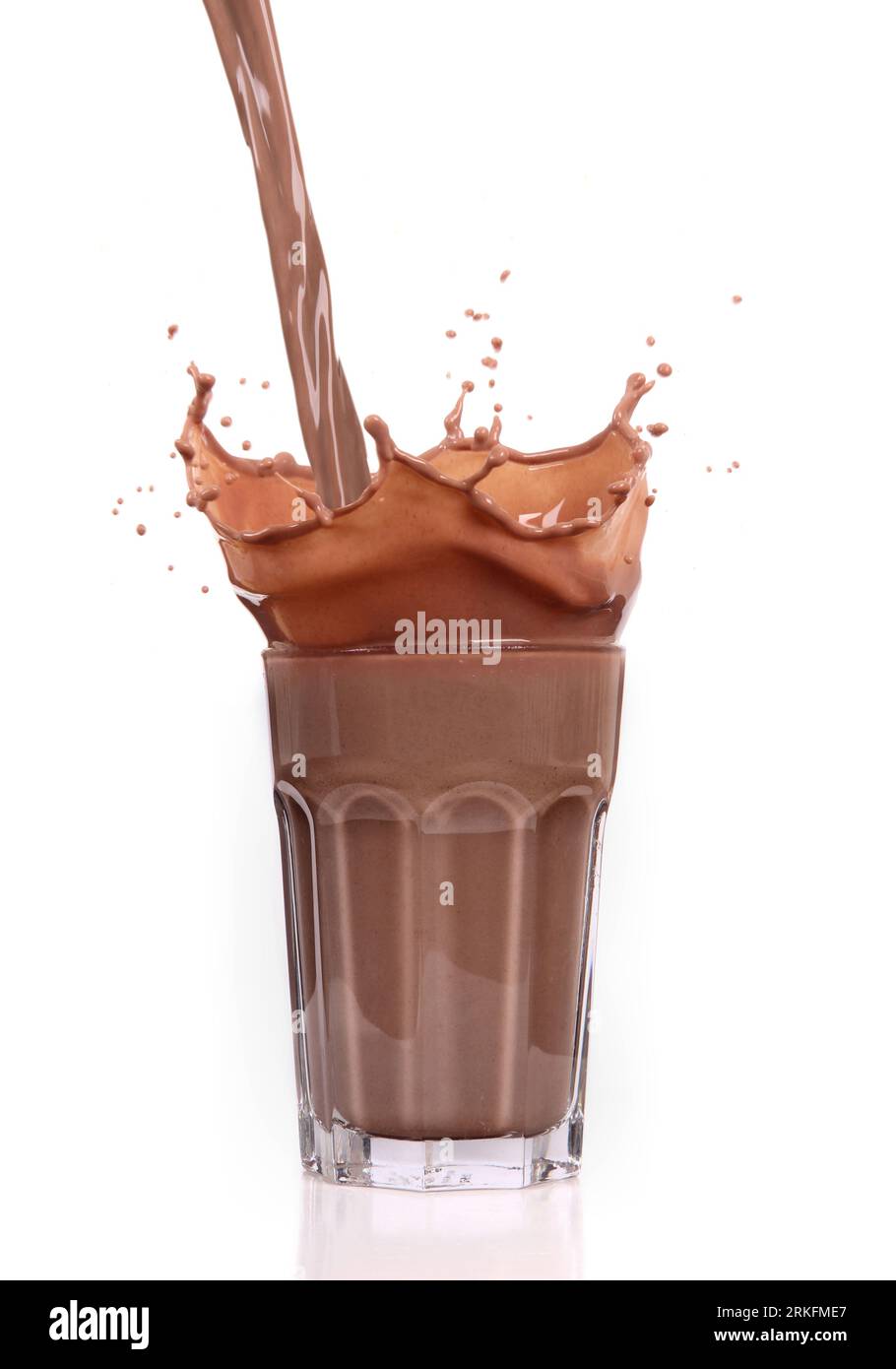 Pouring chocolate milk with splashing, Isolated on white background ...