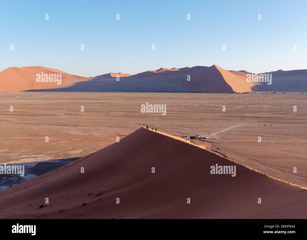 A scenic view of sunset over Namib desert at Naukluft National Park in ...
