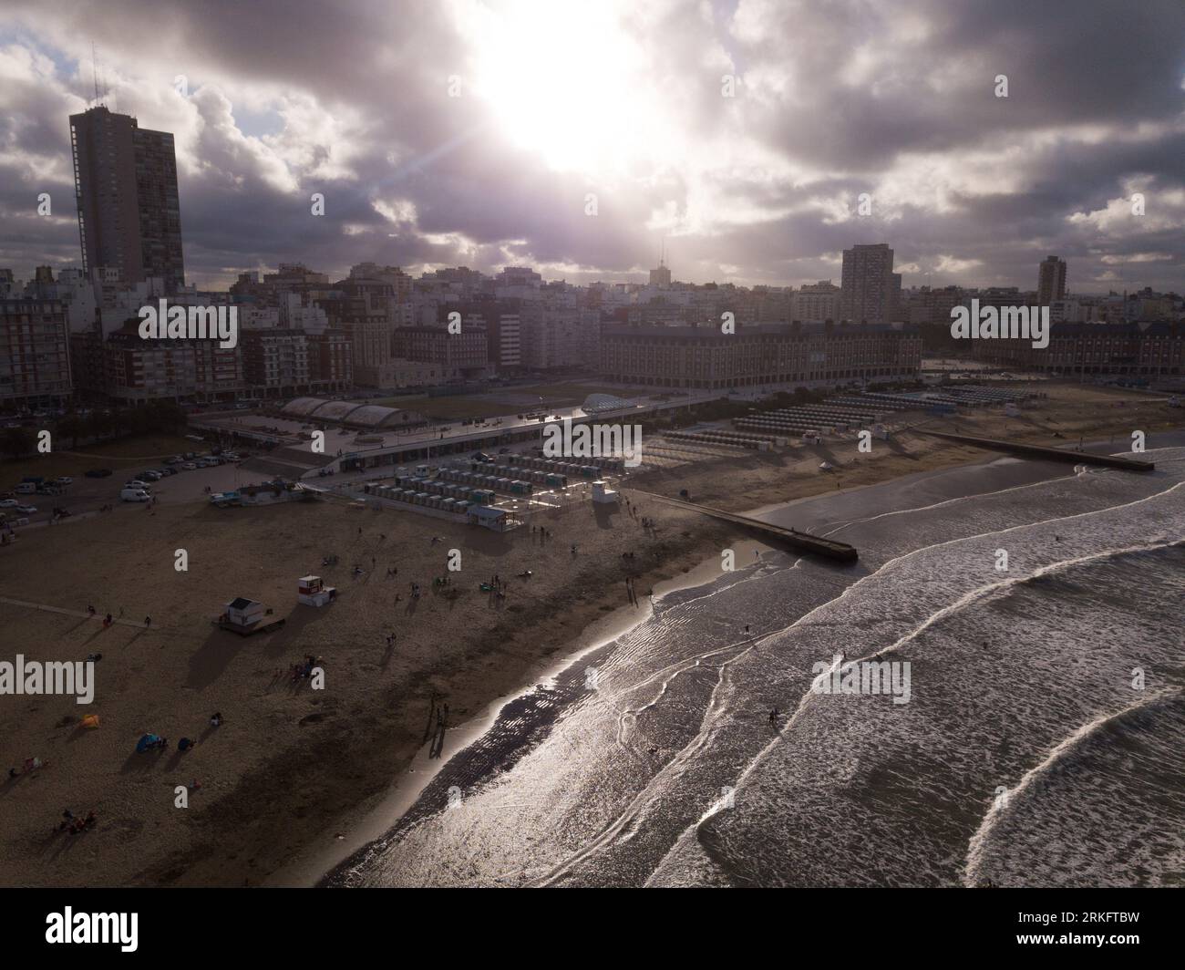 A spectacular aerial view of a coastal cityscape, featuring a sprawling ...