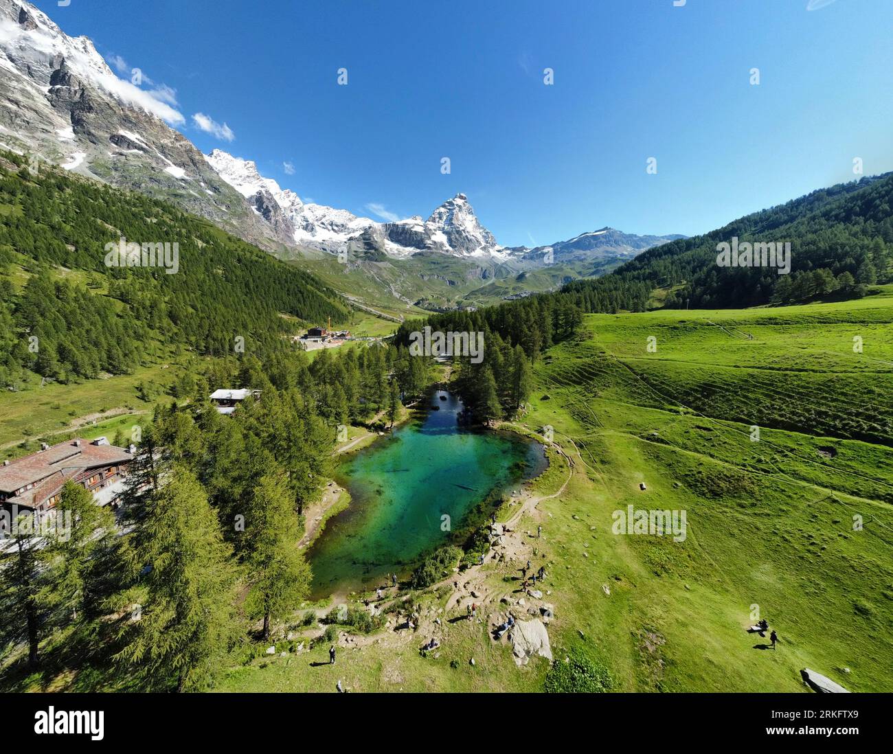 An aerial view of Lago Blu, a picturesque mountain lake located in the ...