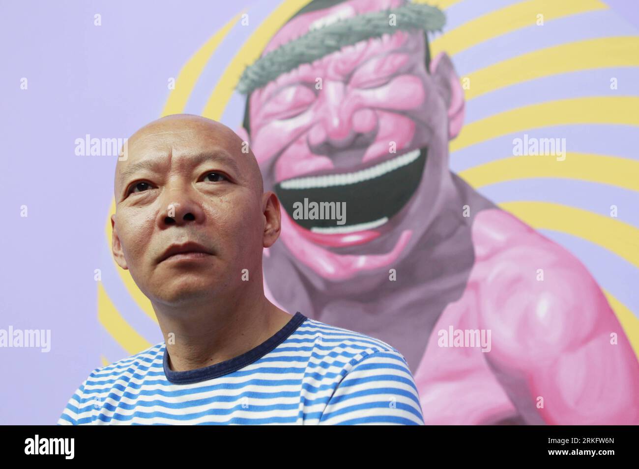 Yue minjun hi-res stock photography and images - Alamy