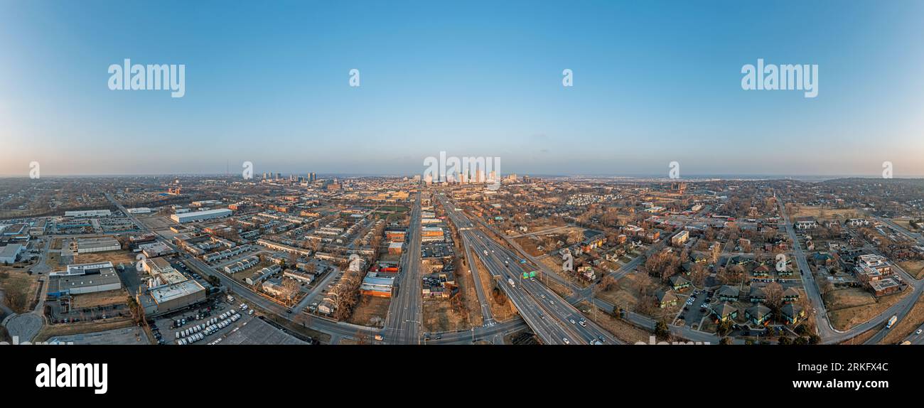 An aerial panoramic view of the skyline of Kansas City during sunrise ...