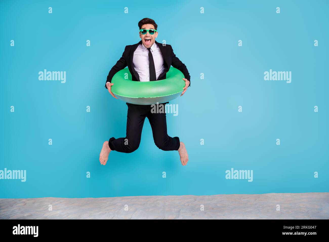 Full length photo of cool excited man wear black suit jumping high ...