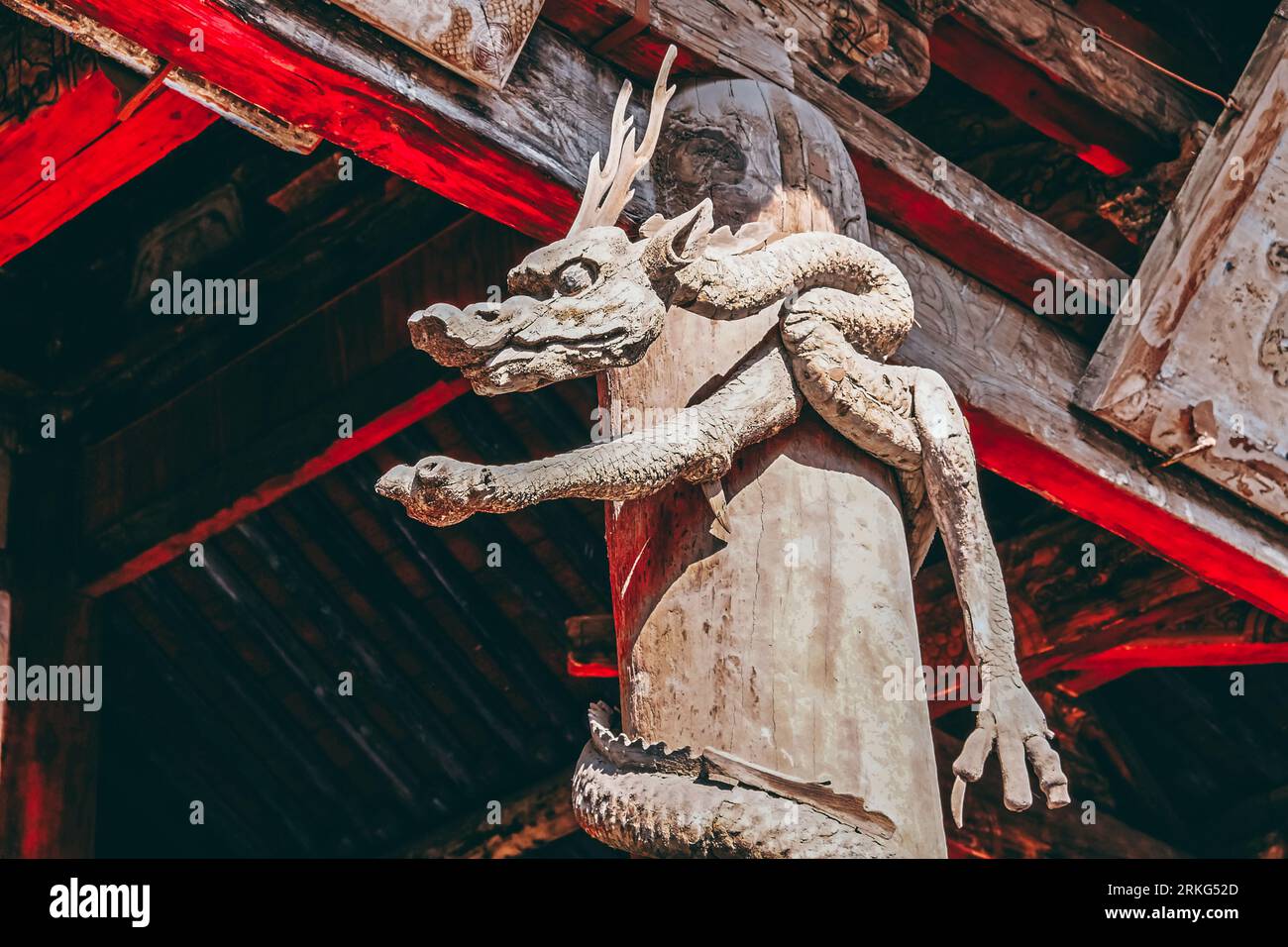 An artfully crafted wooden dragon statue in the Virgin Hall of Shanxi ...