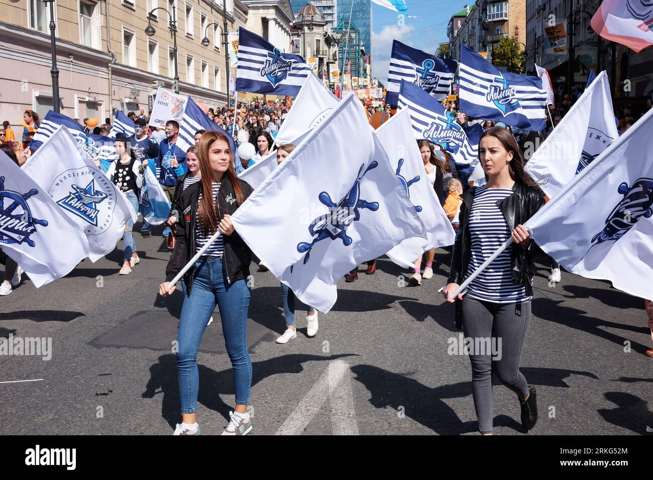 A cheerful group of people at the Tiger Day Parade in Vladivostok ...