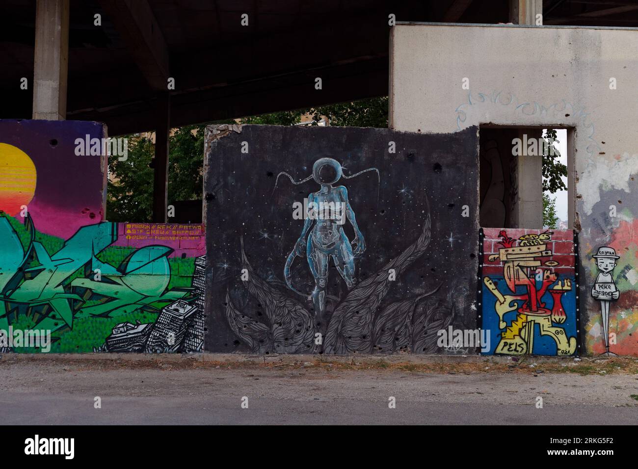 Alien themed Street Art at the bottom of an abandoned multi storied ...