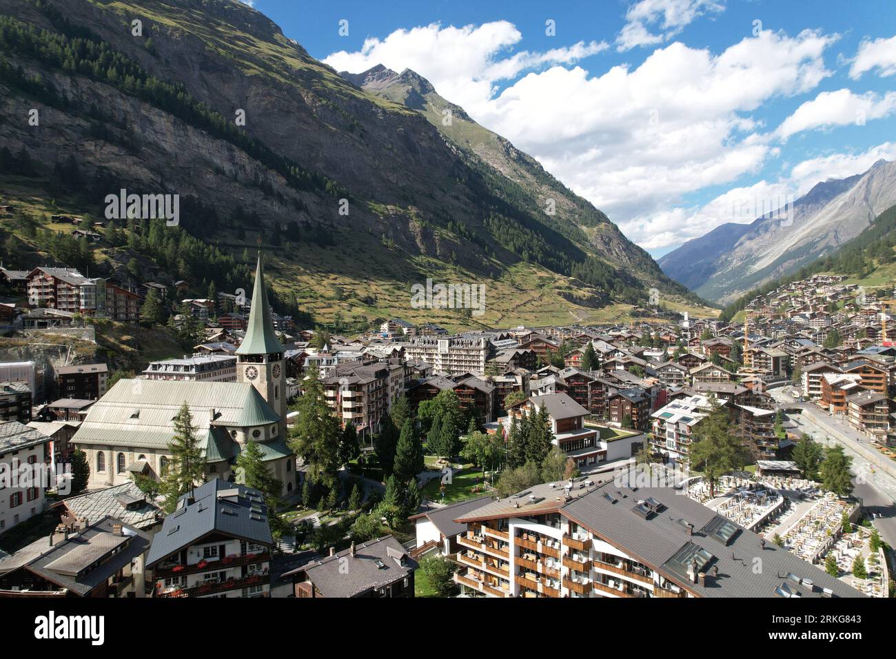 An aerial view of the Pfarrkirche Saint Mauritius Church in Zermatt ...