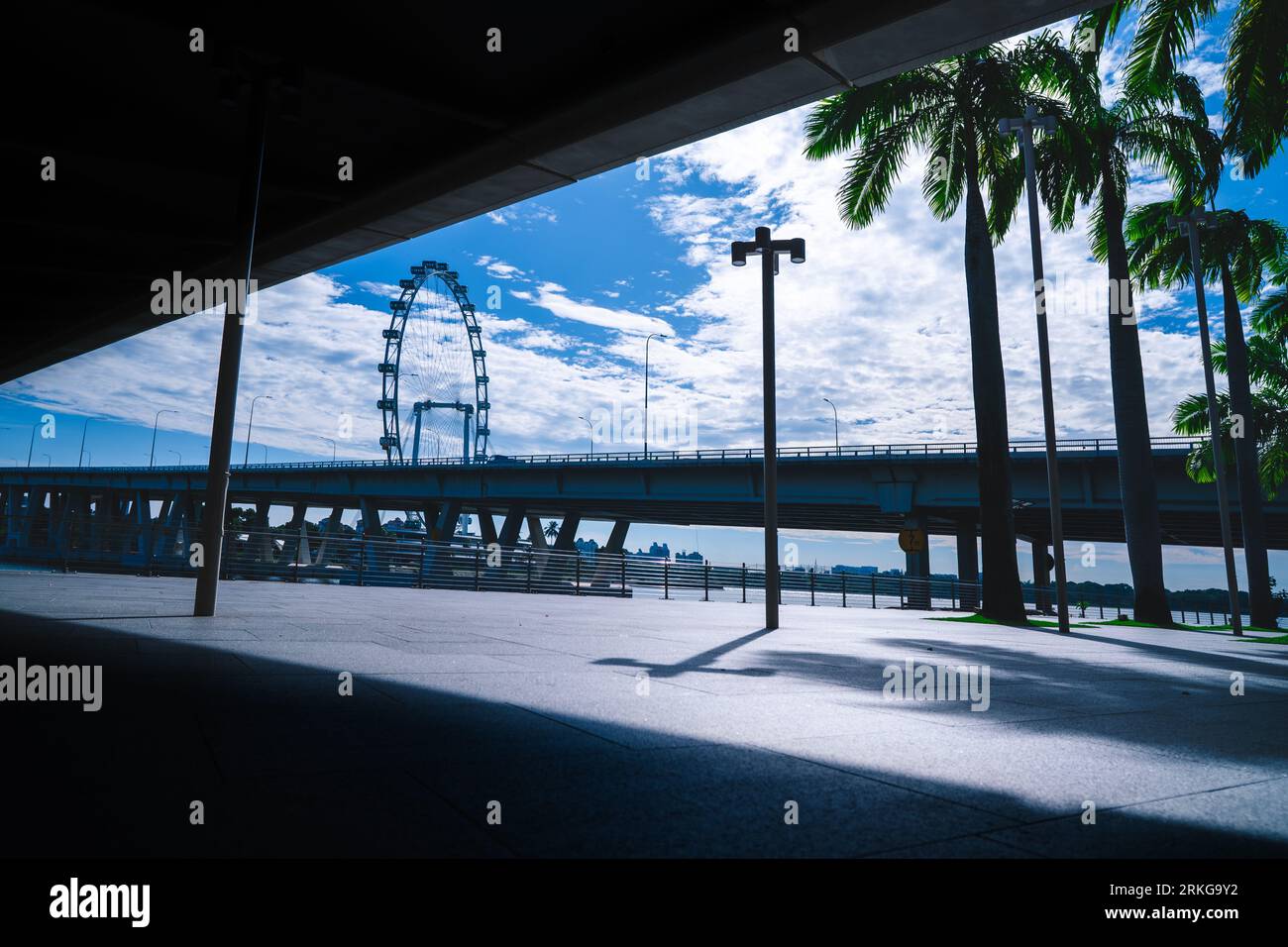Under bridge view Panoramic image of singapore skyline at sunrise Stock ...