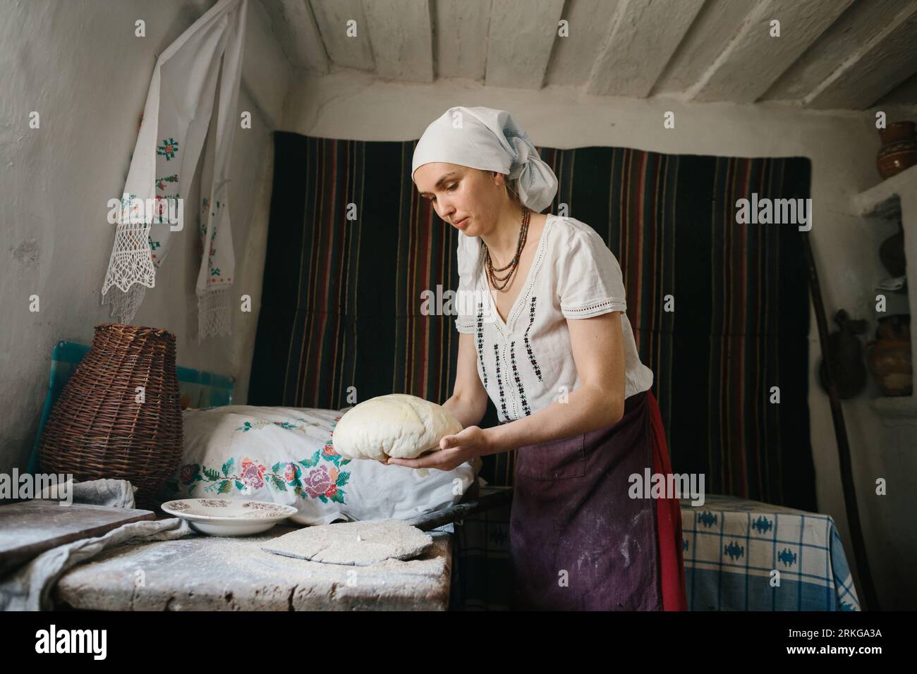 The process of baking homemade bread in wood-fired ovens Stock Photo ...