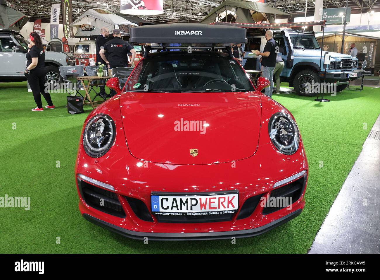 Duesseldorf, Germany. 25th Aug, 2023. A Porsche with a roof tent at the ...