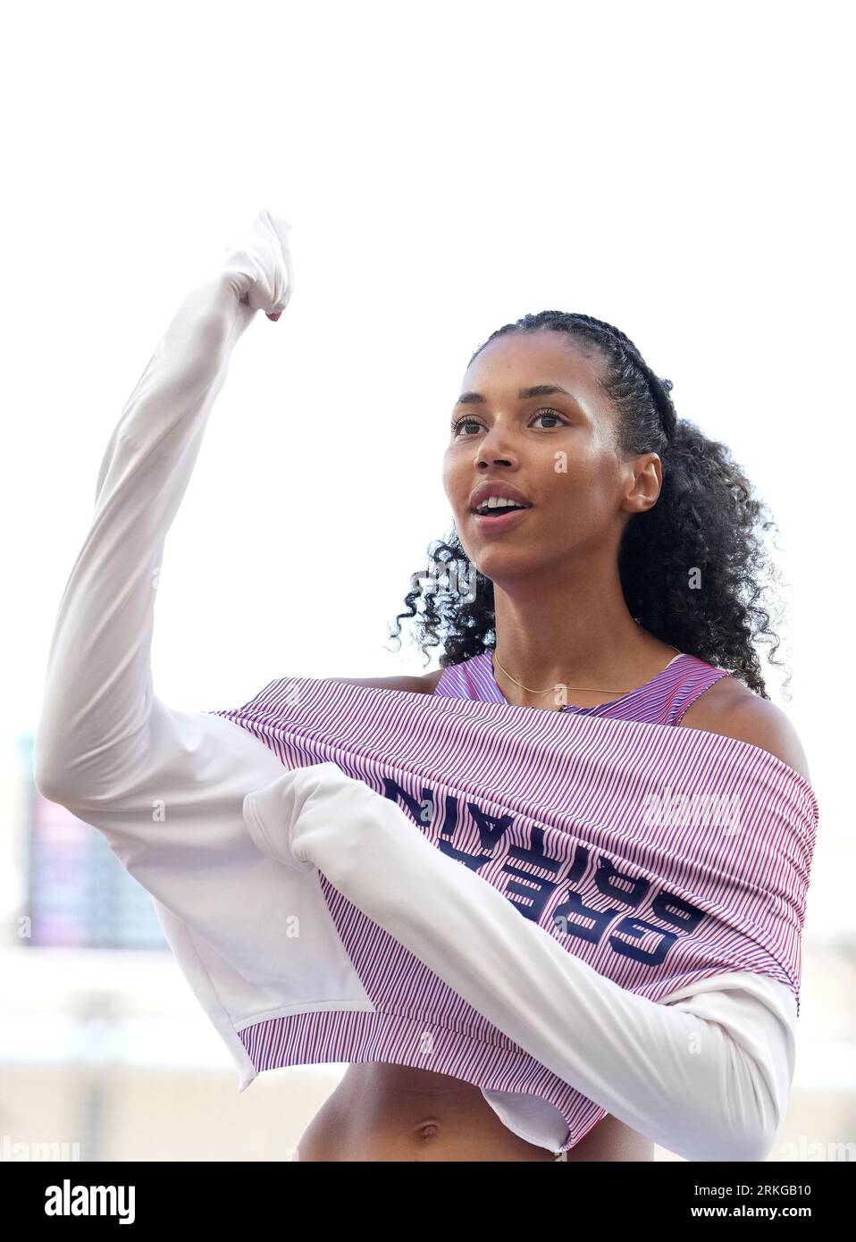 Great Britain's Morgan Lake talks to her coach between between jumps as ...