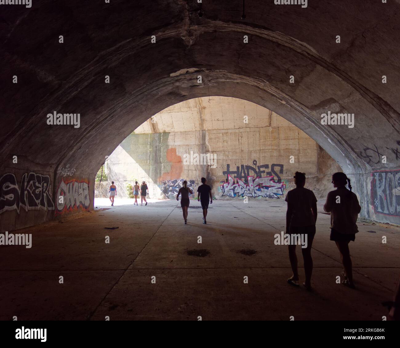 Tour group explore an old secret underground bunker used by Yugoslav ...