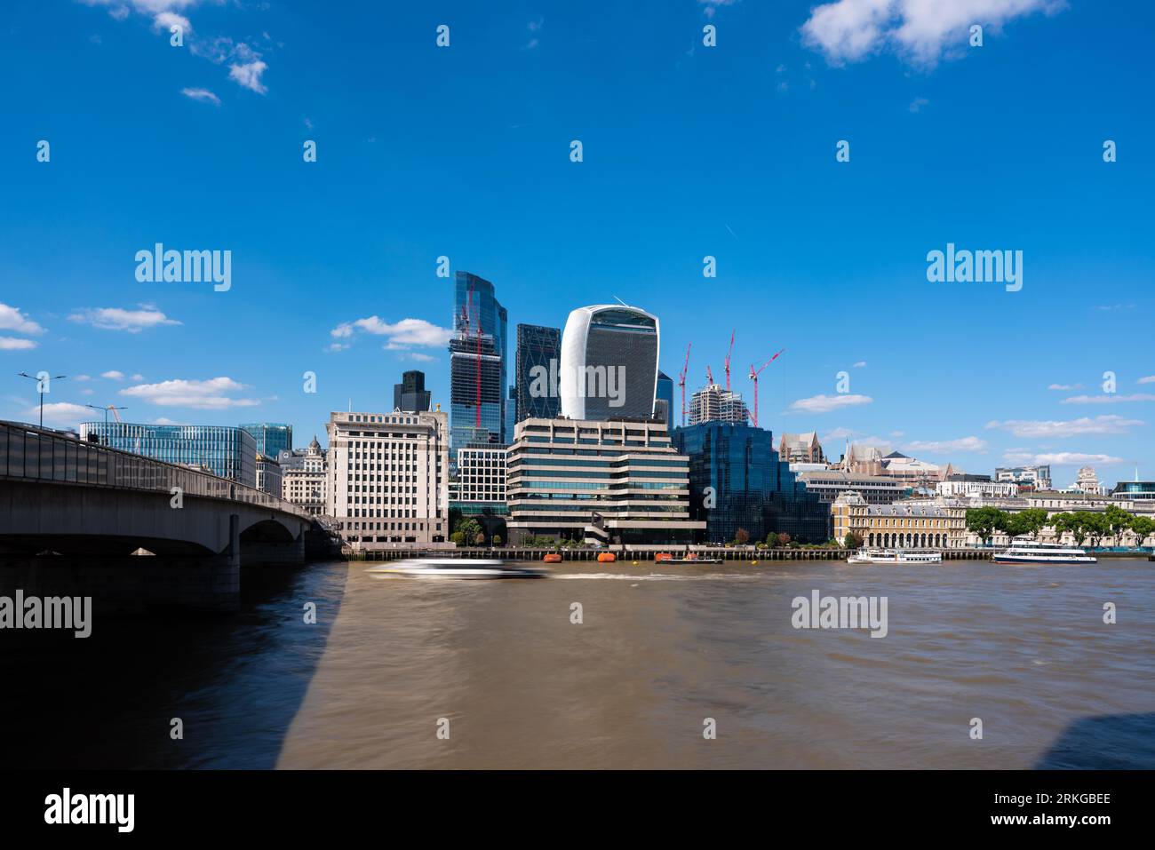 the city of London, UK showing the iconic skyline and the River Thames ...