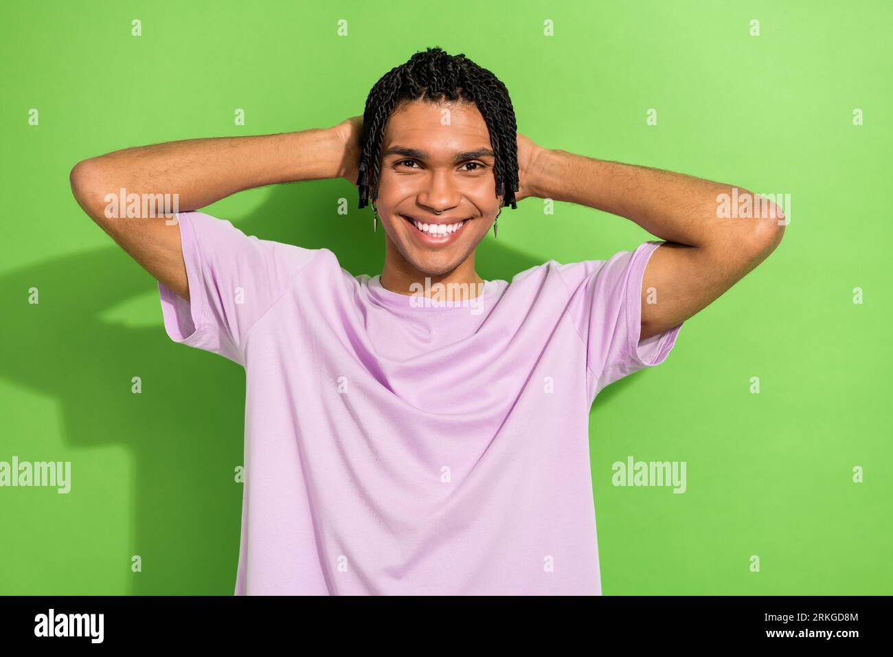 Photo of nice positive person toothy smile hands behind head enjoy free ...