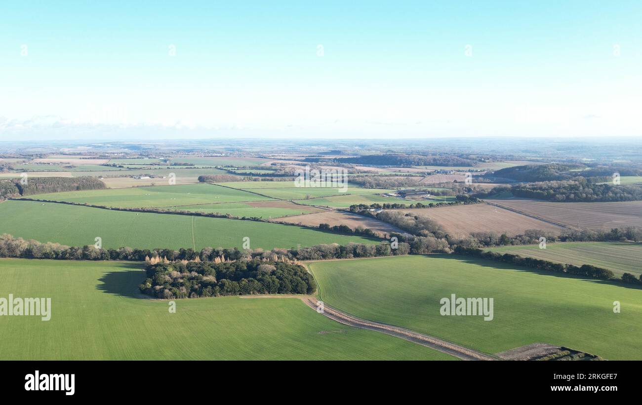 An aerial view of the picturesque countryside, with rolling hills ...
