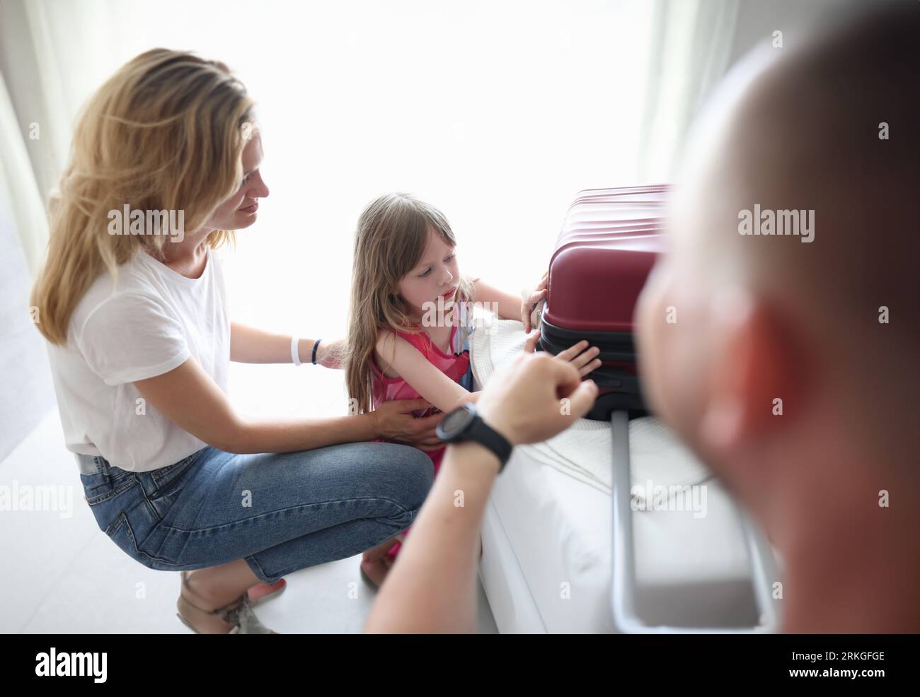 Parents consoling sad child hi-res stock photography and images - Alamy